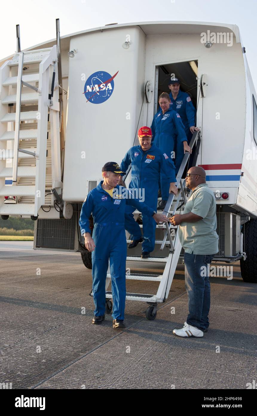 STS-135 Commander Chris Ferguson leads his crew out of the Crew ...