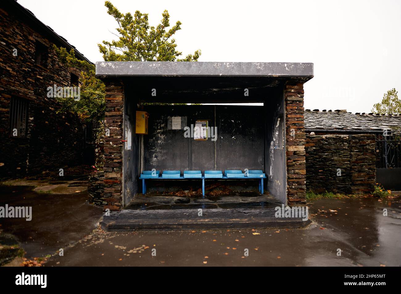 Beautiful shot of an old bus stop on a rainy day Stock Photo - Alamy
