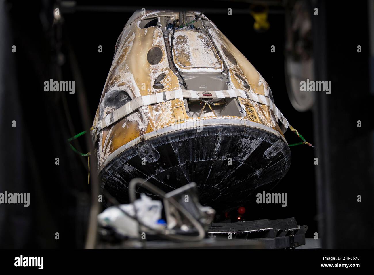 The SpaceX Crew Dragon Endeavour spacecraft is lifted onto the GO ...