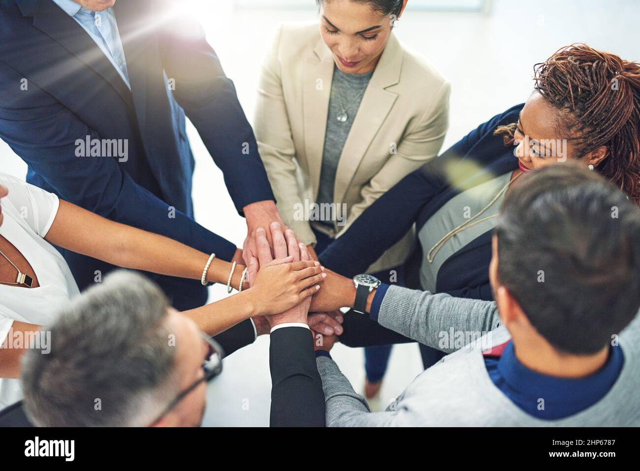 Success is the product of teamwork. Shot of corporate colleagues ...