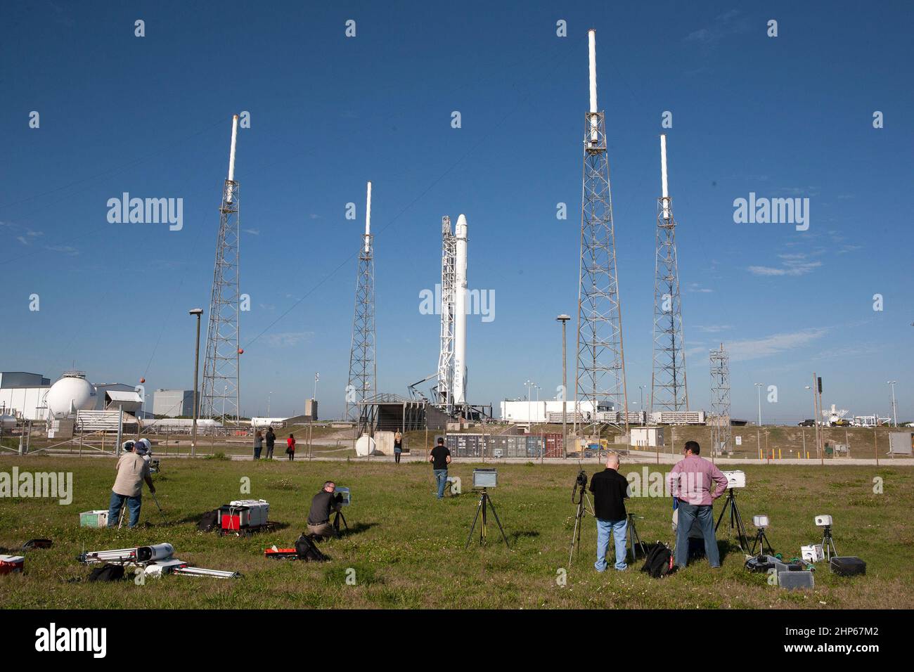 As a Falcon 9 rocket stands ready for lifts off at Cape Canaveral Air ...