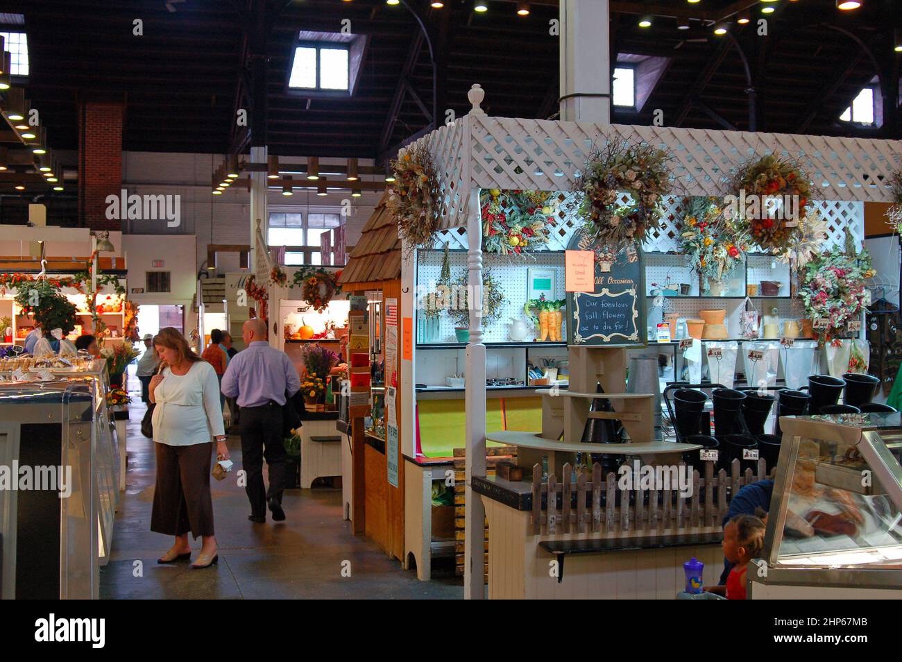 Shoppers browse amongst the organic food and Amish style crafts at the ...