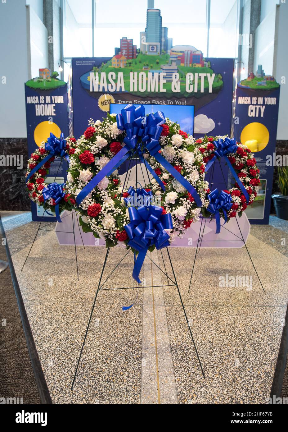 Wreaths are seen in the lobby of NASA Headquarters on NASA's Day of ...