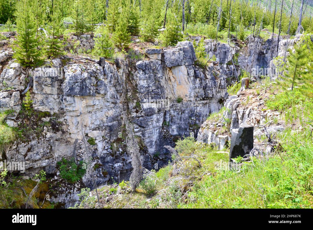 Colourful cliffside view of Marble Canyon in Kootenay National Park ...