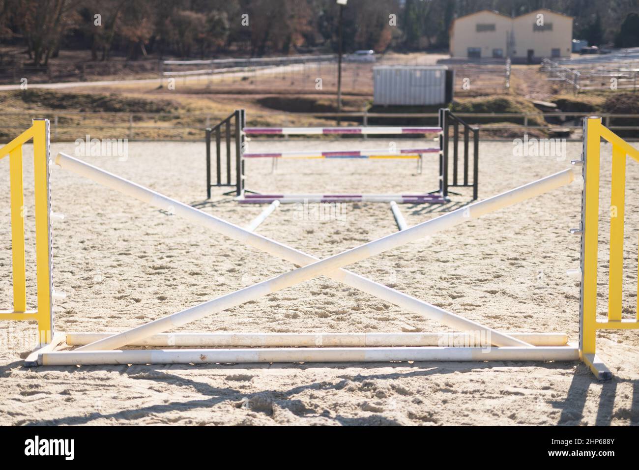 Wooden barriers for jumping horses Stock Photo - Alamy