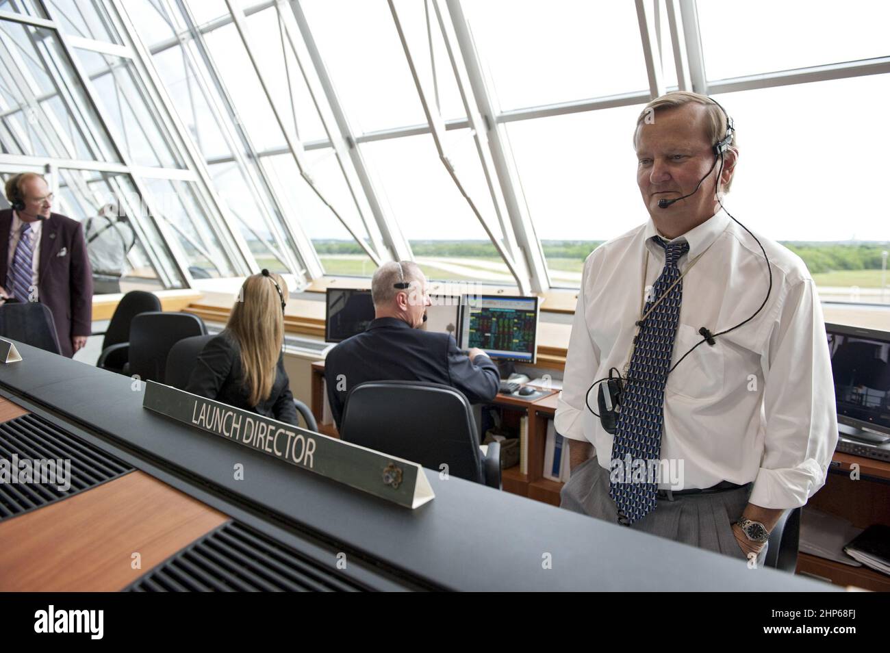 Shuttle Launch Director Mike Leinbach monitors the countdown to liftoff ...