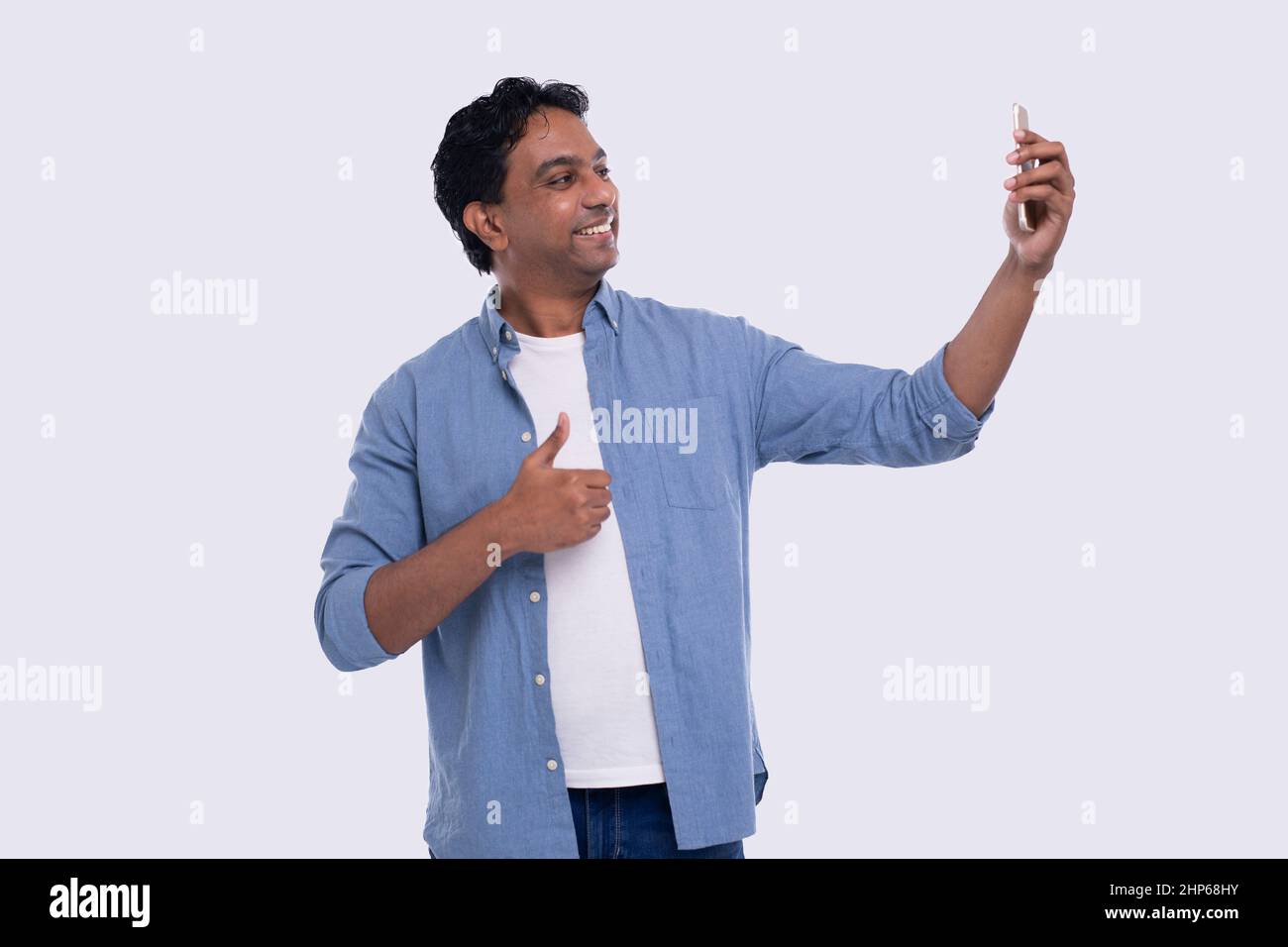 Indian Man Having Video Call on Phone Showing Thumb Up Isolated. Man ...