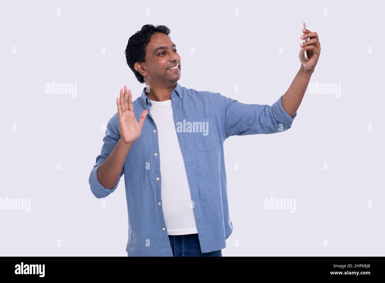 Indian Man Having Video Call on Phone Waving Isolated. Man Video Call ...