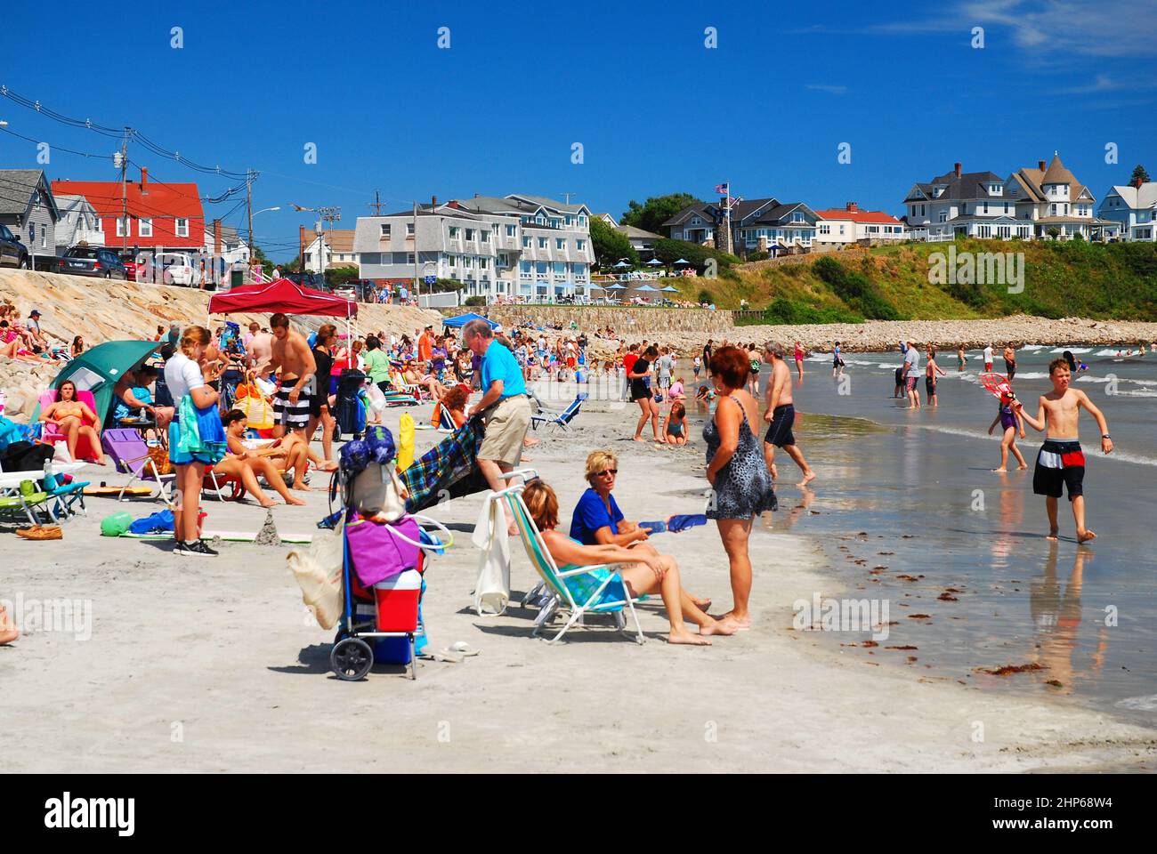 A crowd relaxes on the narrow beach in York, Maine Stock Photo - Alamy