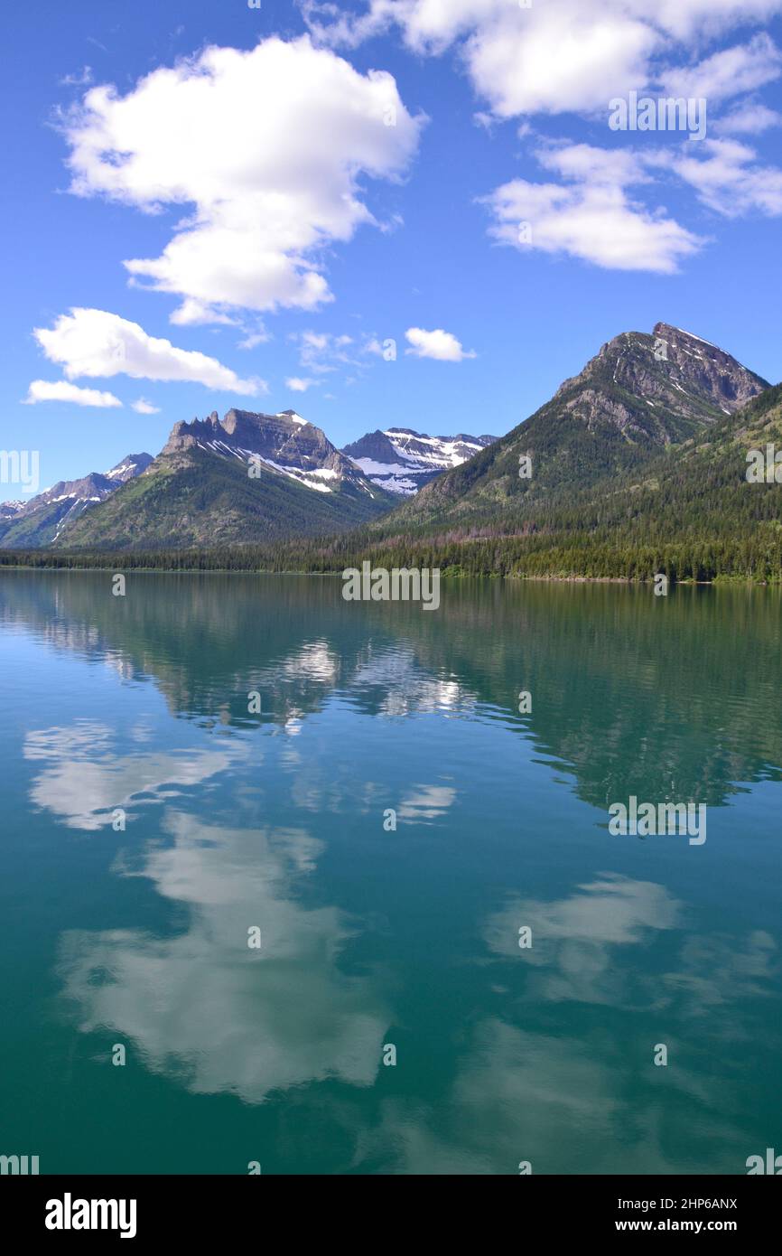 Olson Mountain and Citadel Peaks reflecting on Upper Waterton Lake at ...