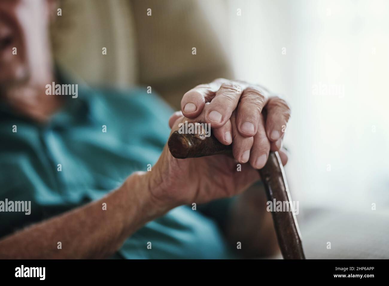 Keeping my third leg close by. Cropped shot of an unrecognizable man ...