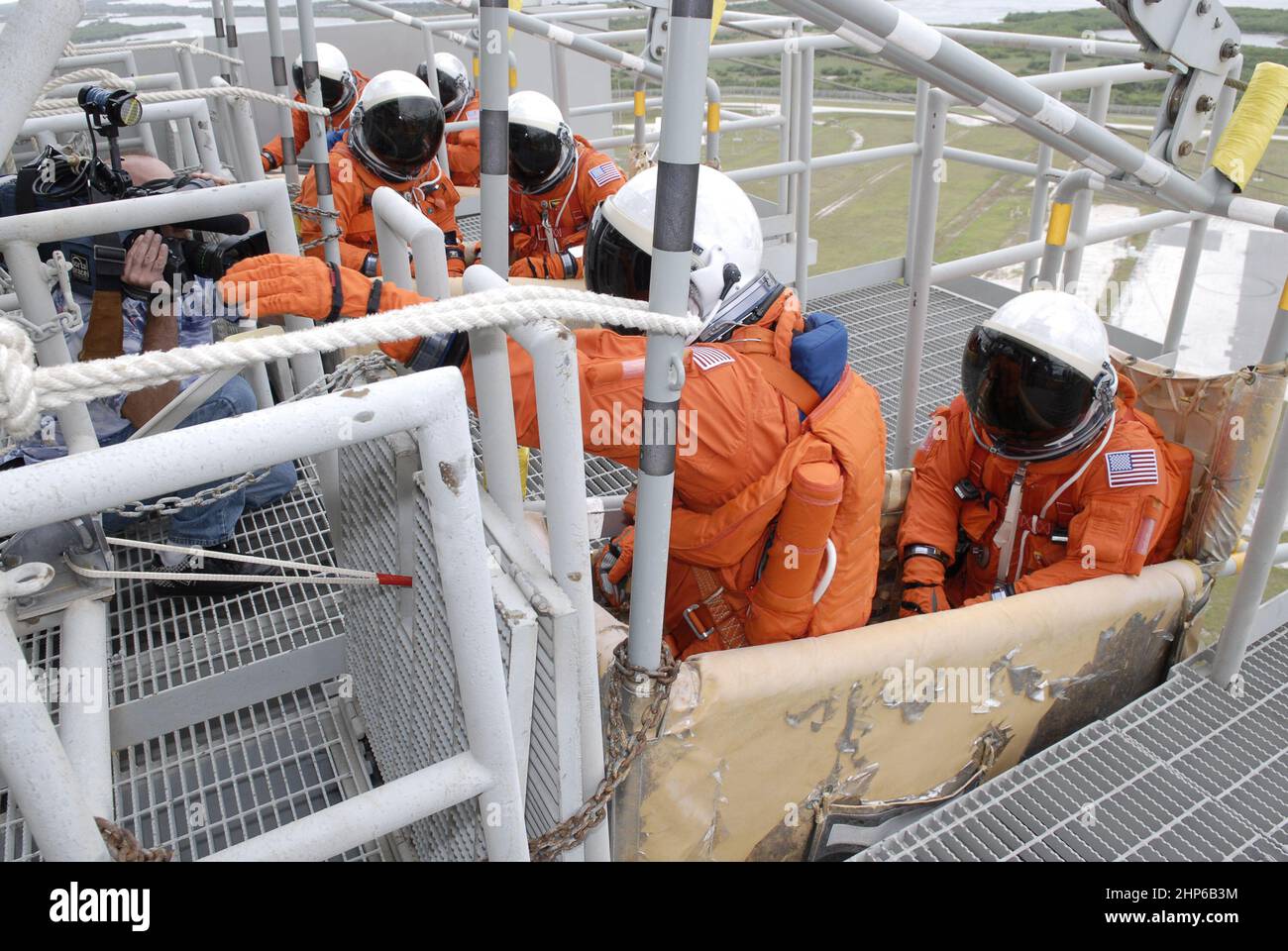 On Launch Pad 39A at NASA's Kennedy Space Center in Florida, members of ...