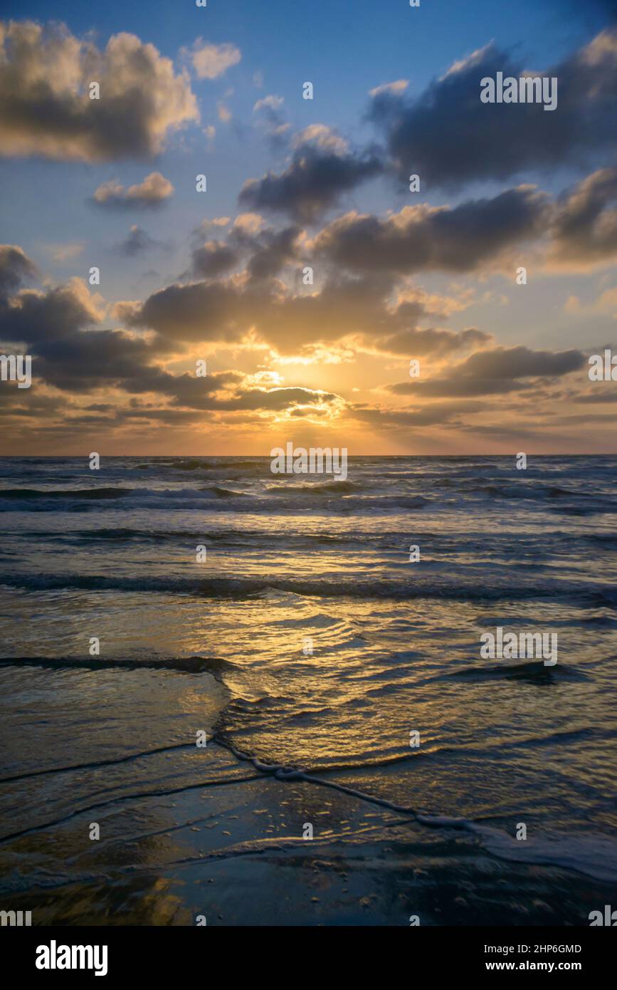 Ocean patterns with Sunrise over the ocean in Texas Stock Photo - Alamy
