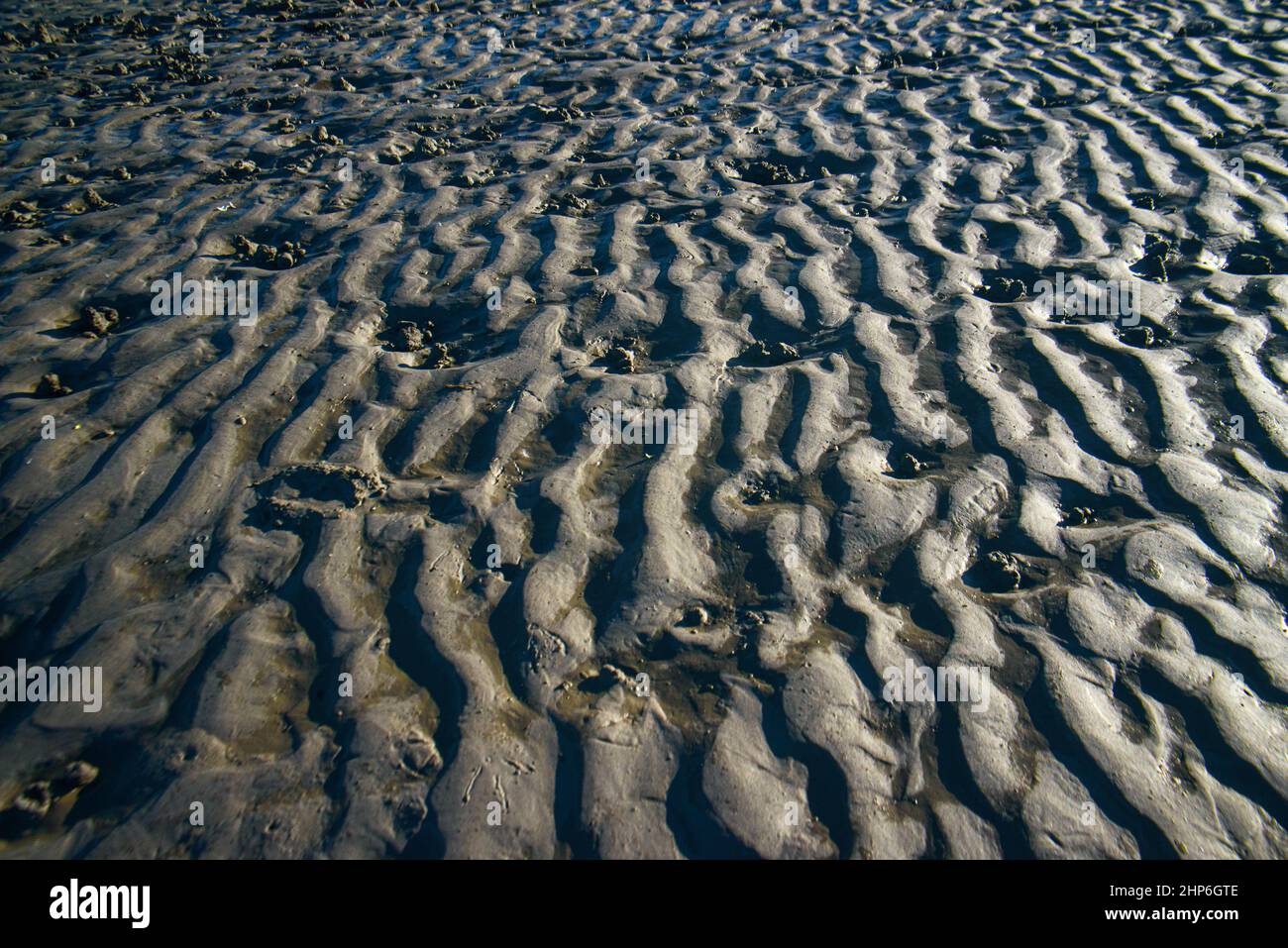 Sand patterns at low tide Stock Photo - Alamy