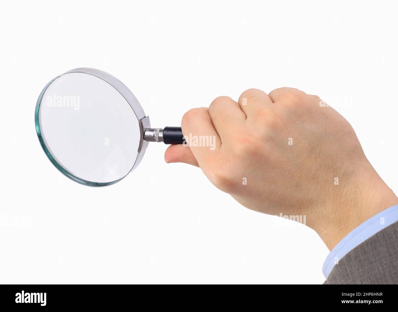 Magnifying glass in hand isolated on white background Stock Photo - Alamy