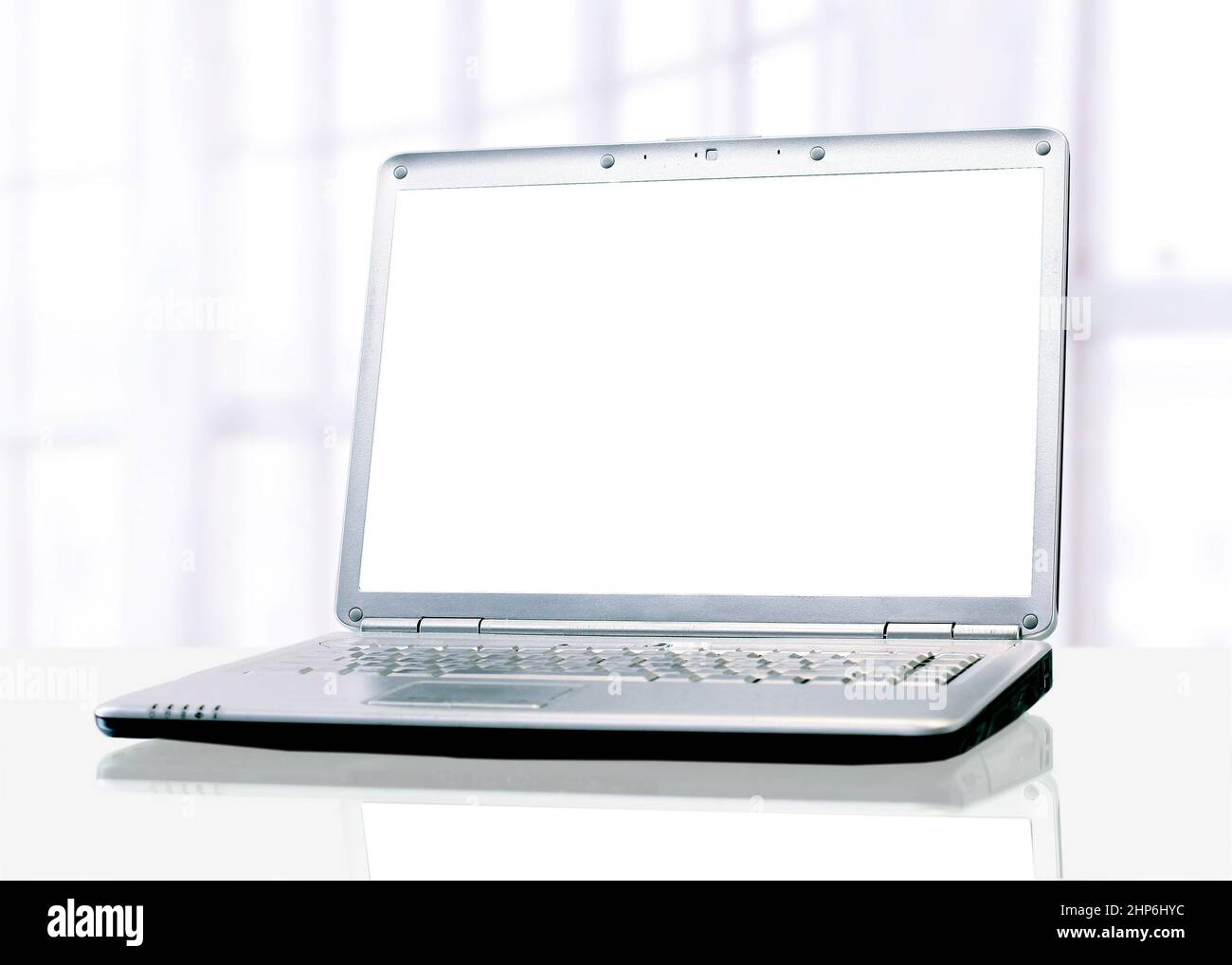 White laptop in the office Stock Photo - Alamy