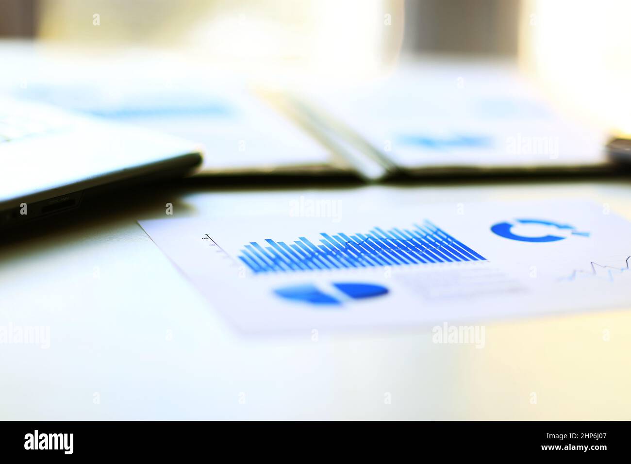 Financial management graphs in a corporate blue color Stock Photo - Alamy