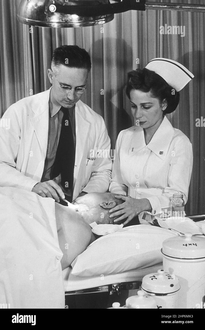 1950s doctor and nurse Black and White Stock Photos & Images - Alamy