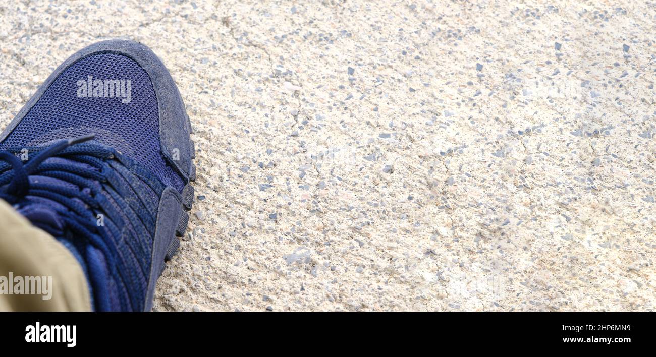 Blue sport shoe on ground. Healthy lifestyle, new beginning concept ...