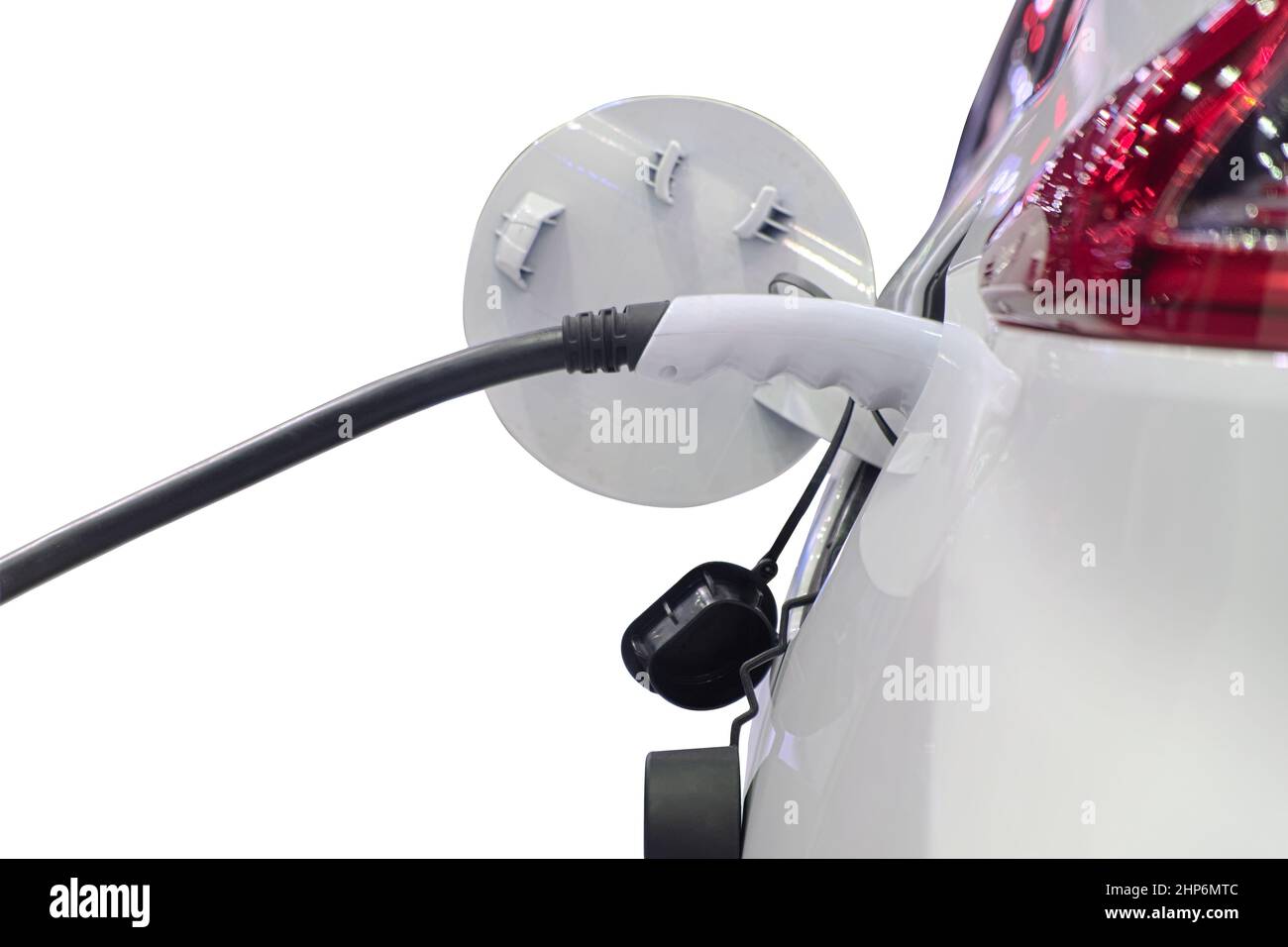 Close-up gripping of electric charge machine connected with plug for ...