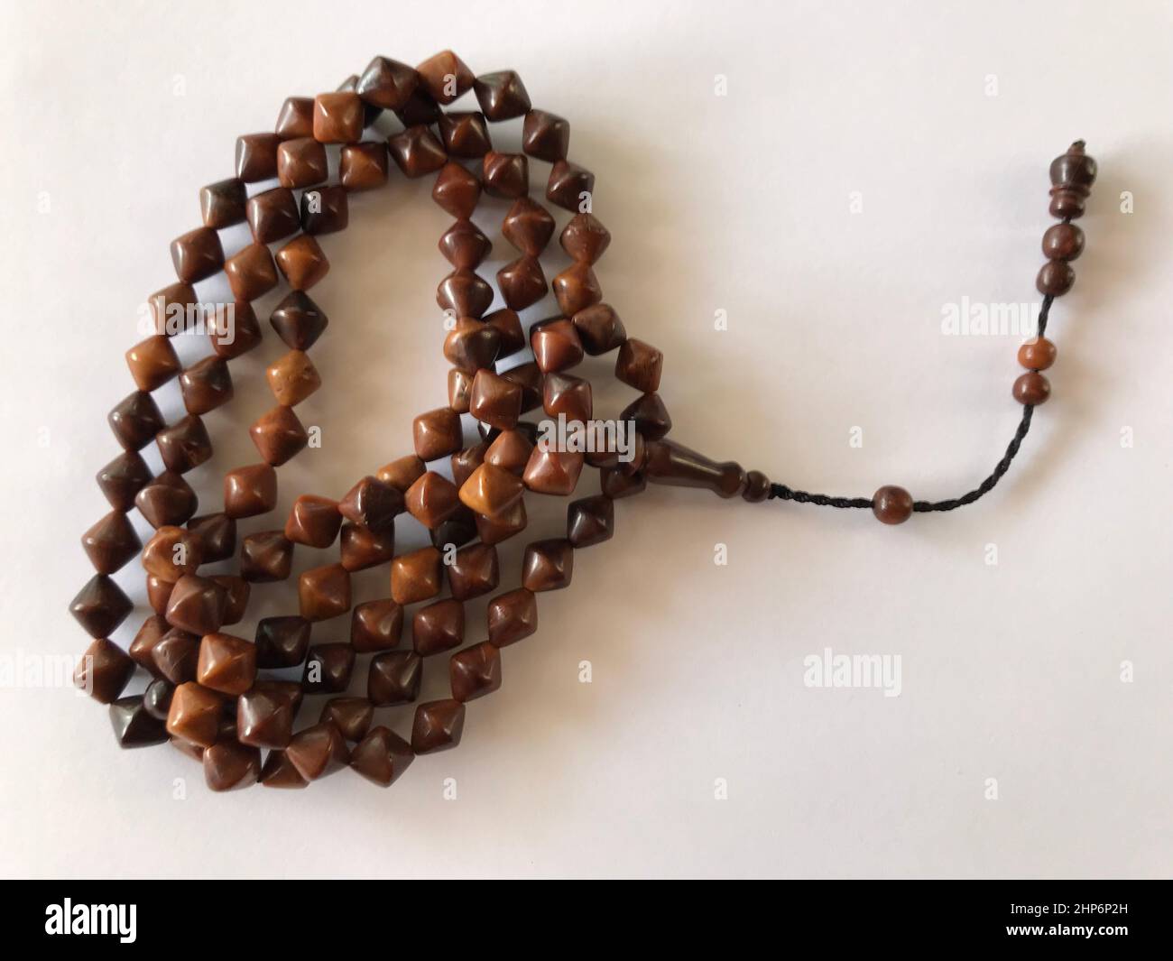 99 Islamic prayer beads on a white background for ramadan, eid adha ...