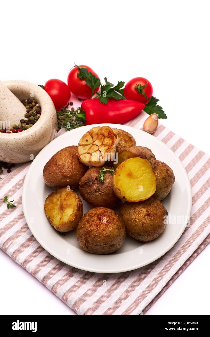 Plate of Baked potato isolated on white background Stock Photo - Alamy