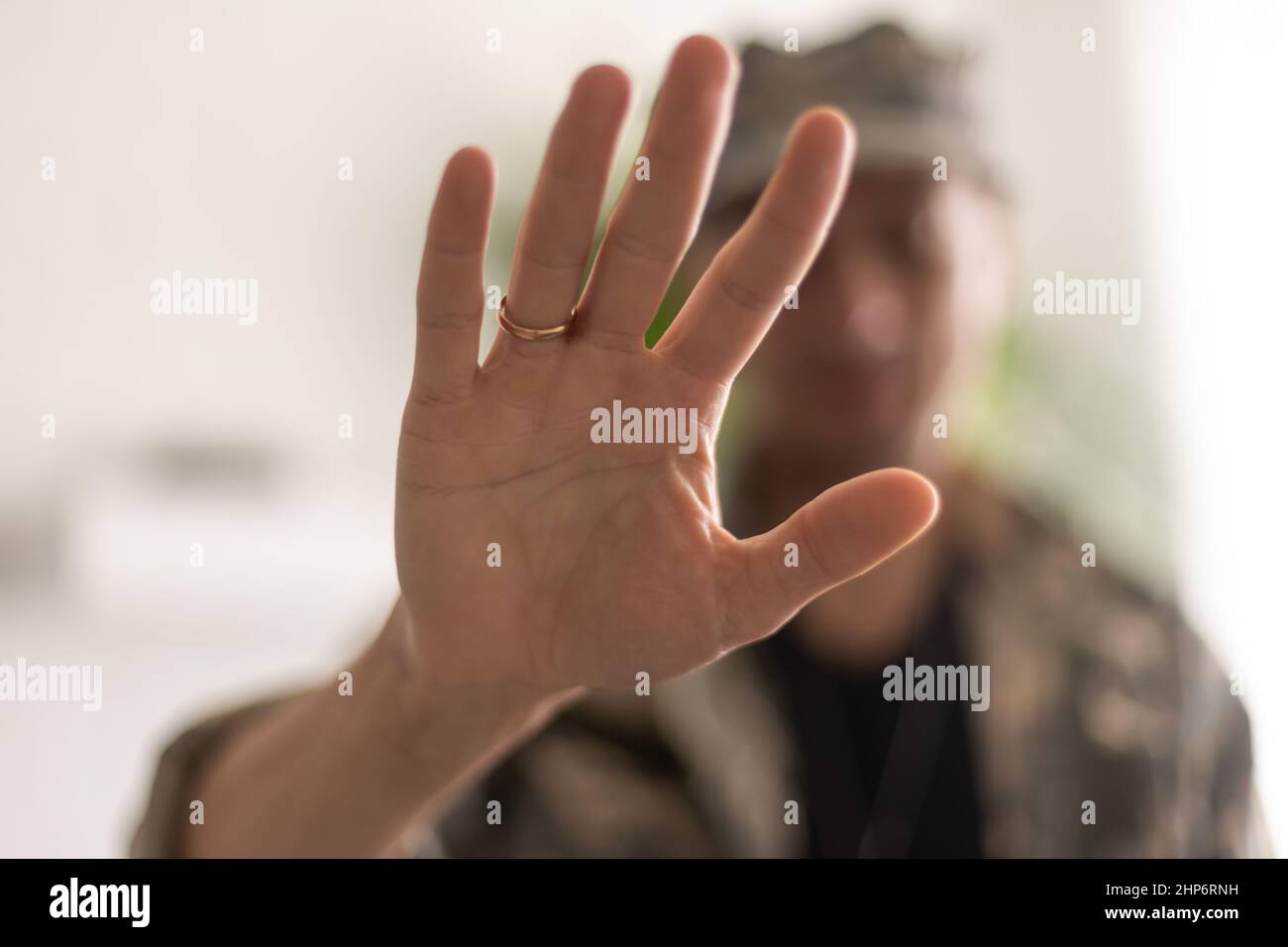 security officer making the stop sign. military Stock Photo - Alamy