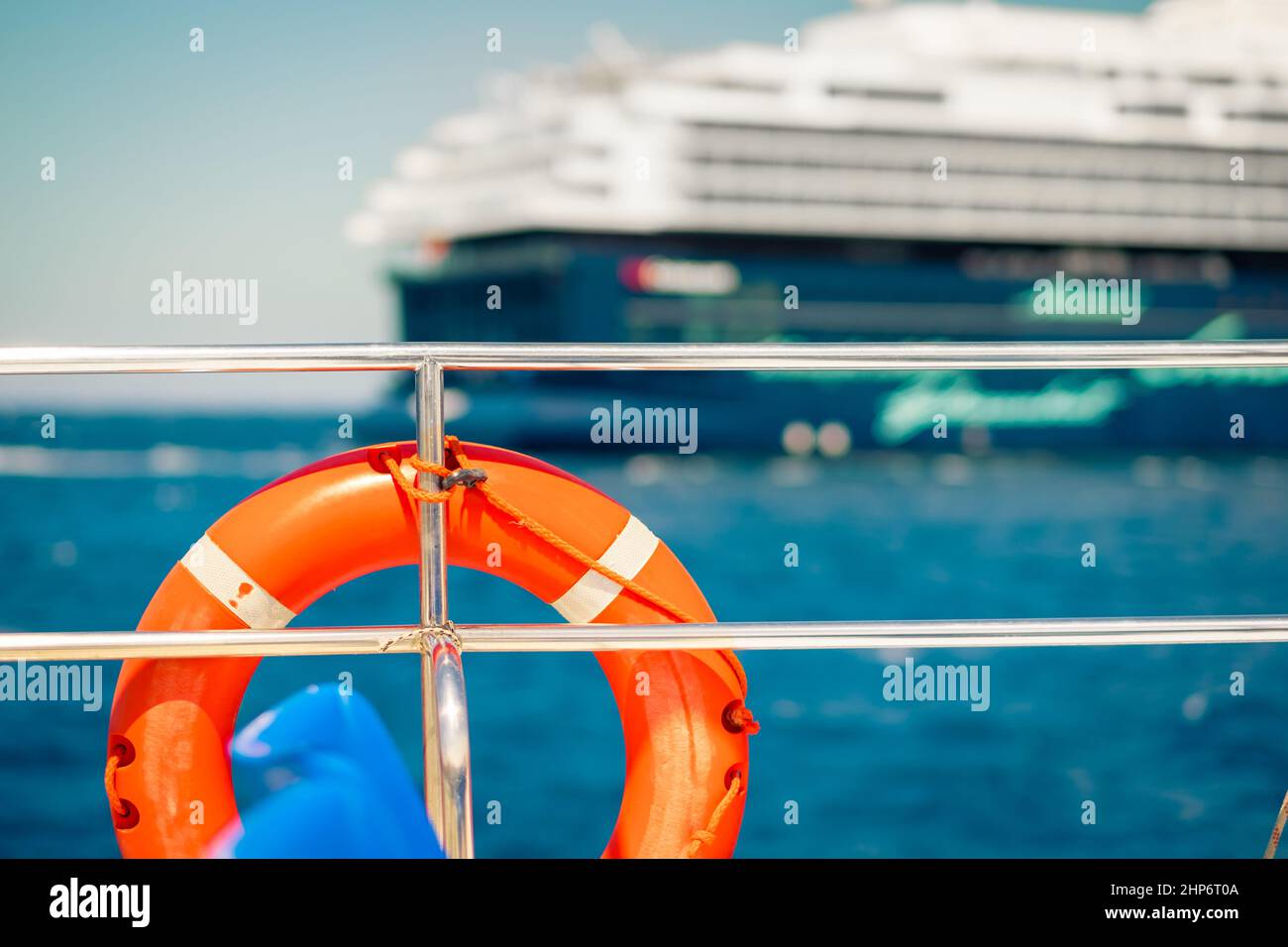 Lifebuoy and cruise ship Stock Photo - Alamy