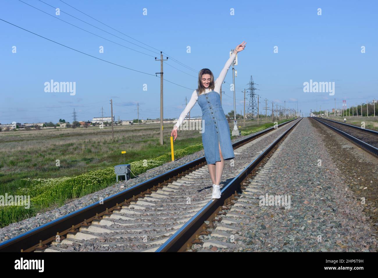 Woman walk on railroad hi-res stock photography and images - Alamy