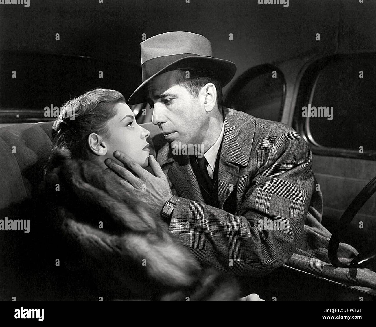 Publicity photo of Lauren Bacall & Humphrey Bogart in American noir ...