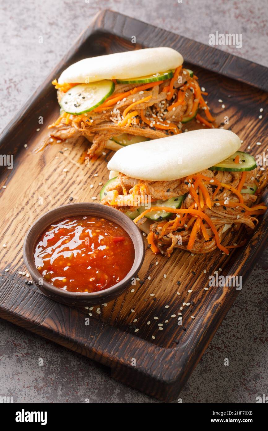 Steamed bao bun filled with pulled pork and vegetables delicious ...