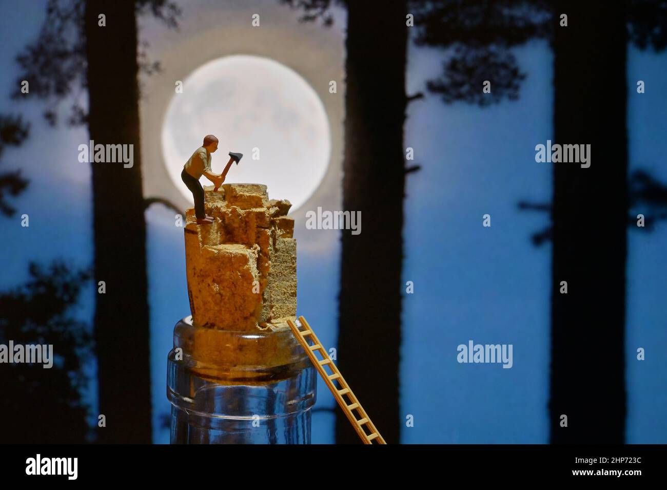 Miniature Lumberjack Worker Cutting Wine Cork With A Large Ax In The ...