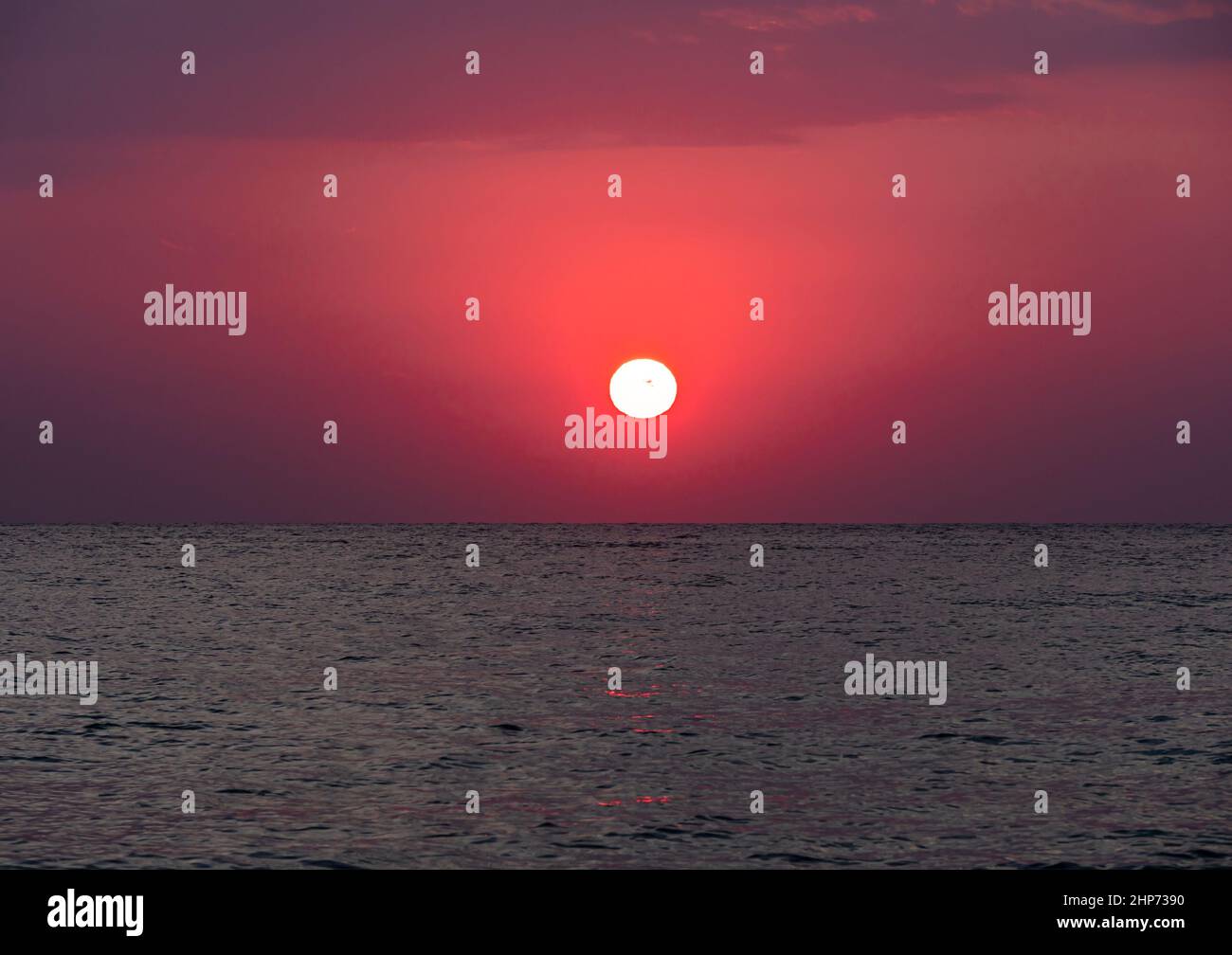 big sun down over sea sunrise, red sky Stock Photo - Alamy