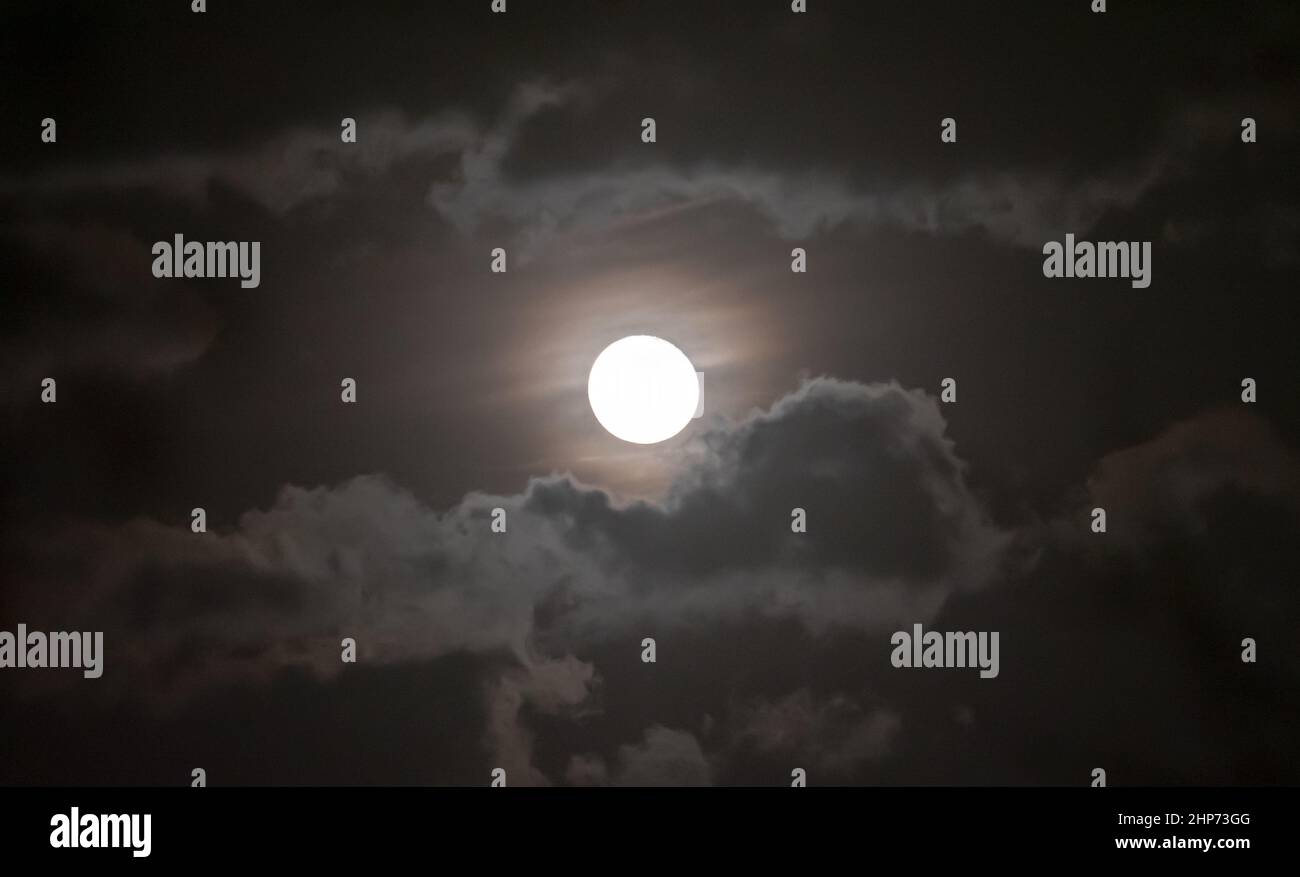full moon in the sky with clouds landscape Stock Photo - Alamy
