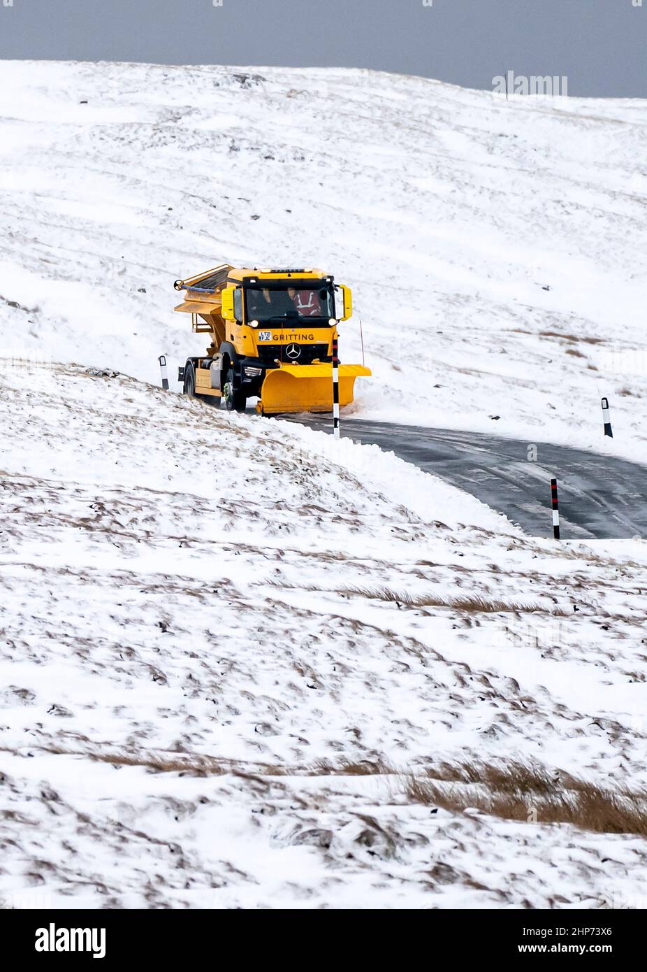 A snow plough on the Buttertubs Pass near Hawes, North Yorkshire, after ...