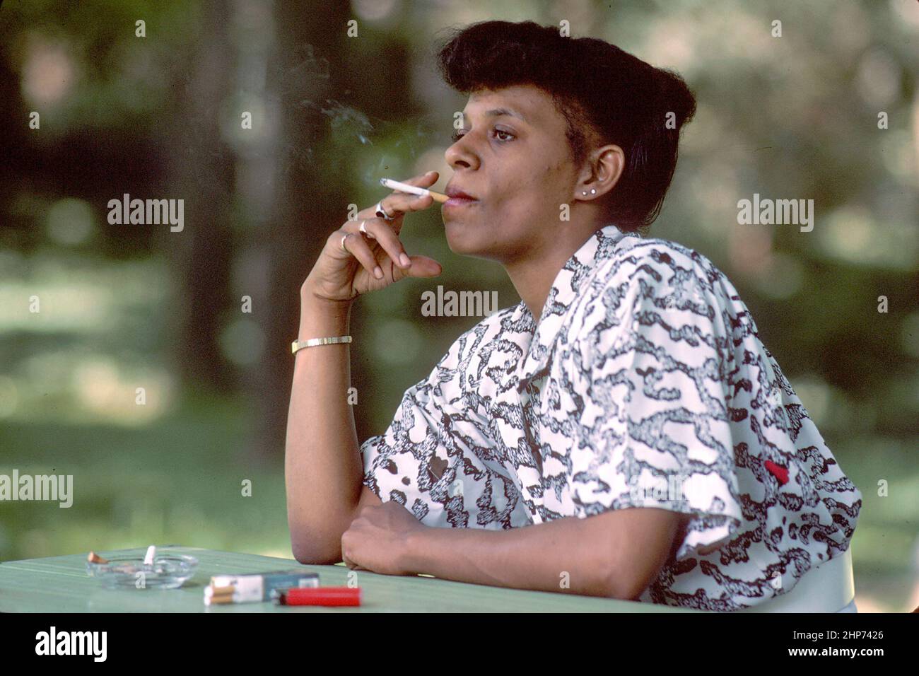 1980s woman smoking a cigarette hi-res stock photography and images - Alamy