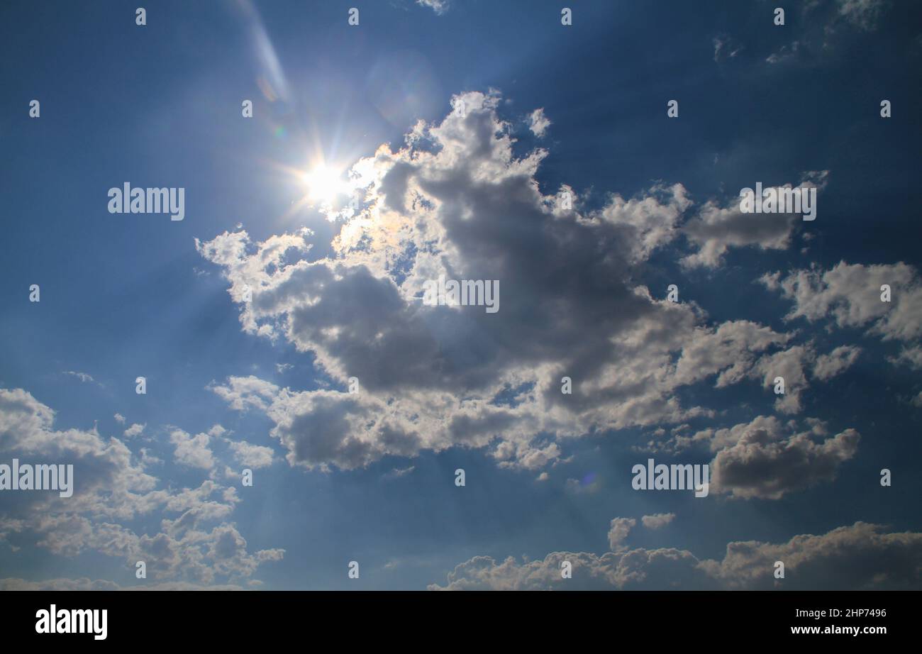 natural clouds blue sky sun ray light Stock Photo - Alamy