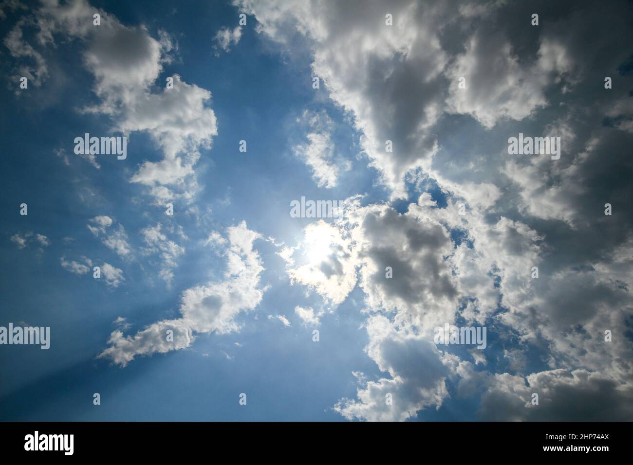 natural clouds blue sky sun ray light Stock Photo - Alamy