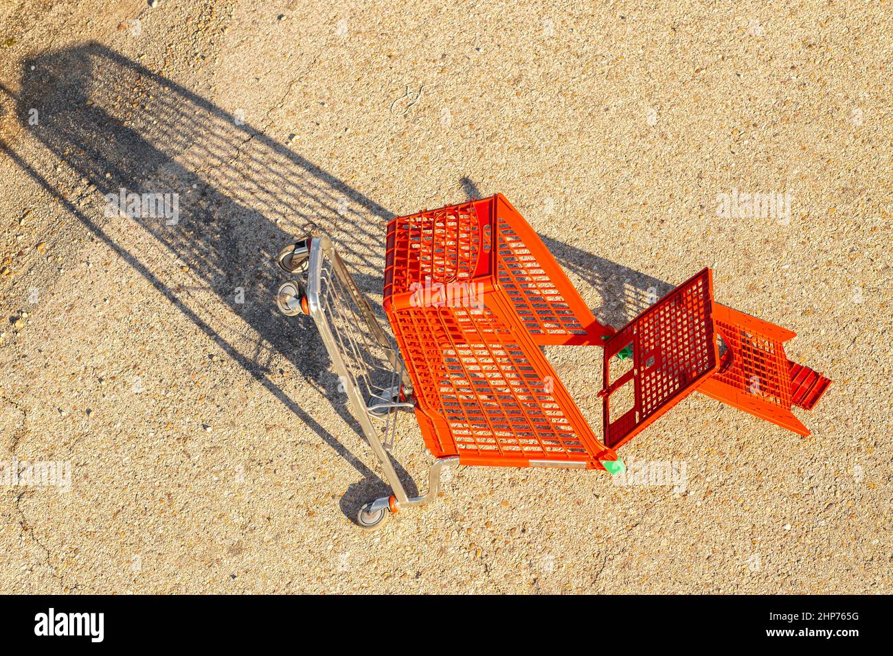supermarket shopping cart overturned in the street Stock Photo - Alamy
