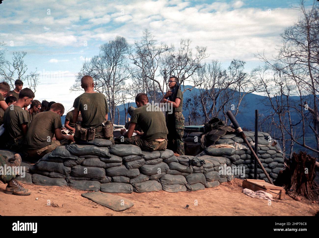 Vietnam War Photos: A Marine entertaining fellow marines at LZ ...