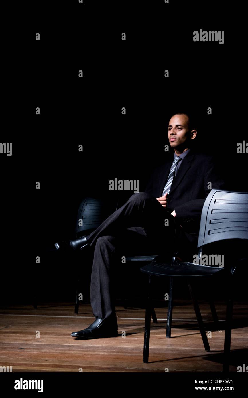 Actor on stage represents a dramatic character. Scene in a theater in ...