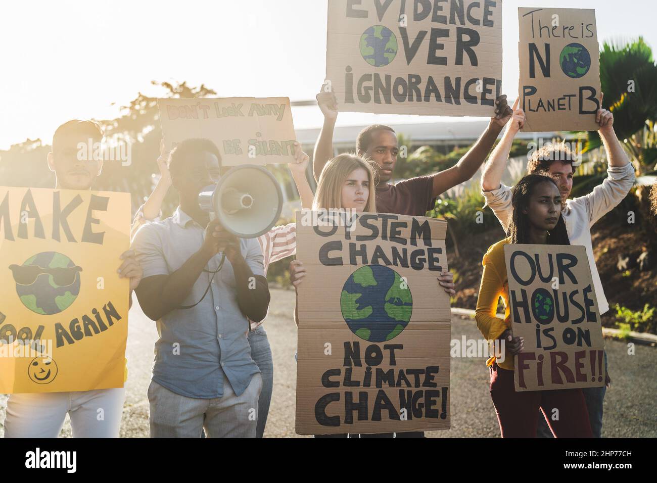 Group of activists protesting for climate change - Multiracial people ...