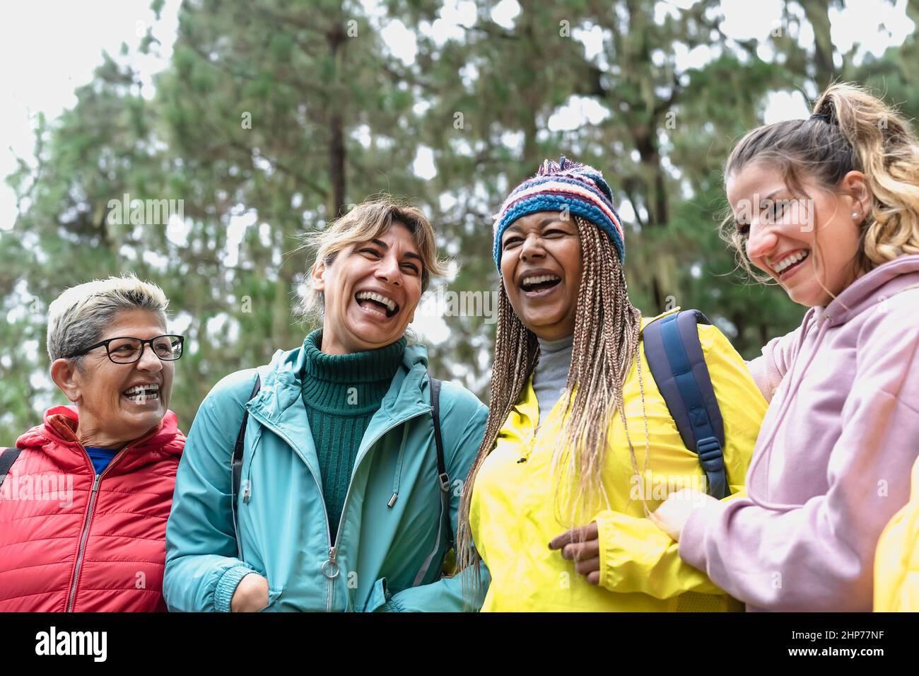 Group of women with different ages and ethnicities having fun walking ...