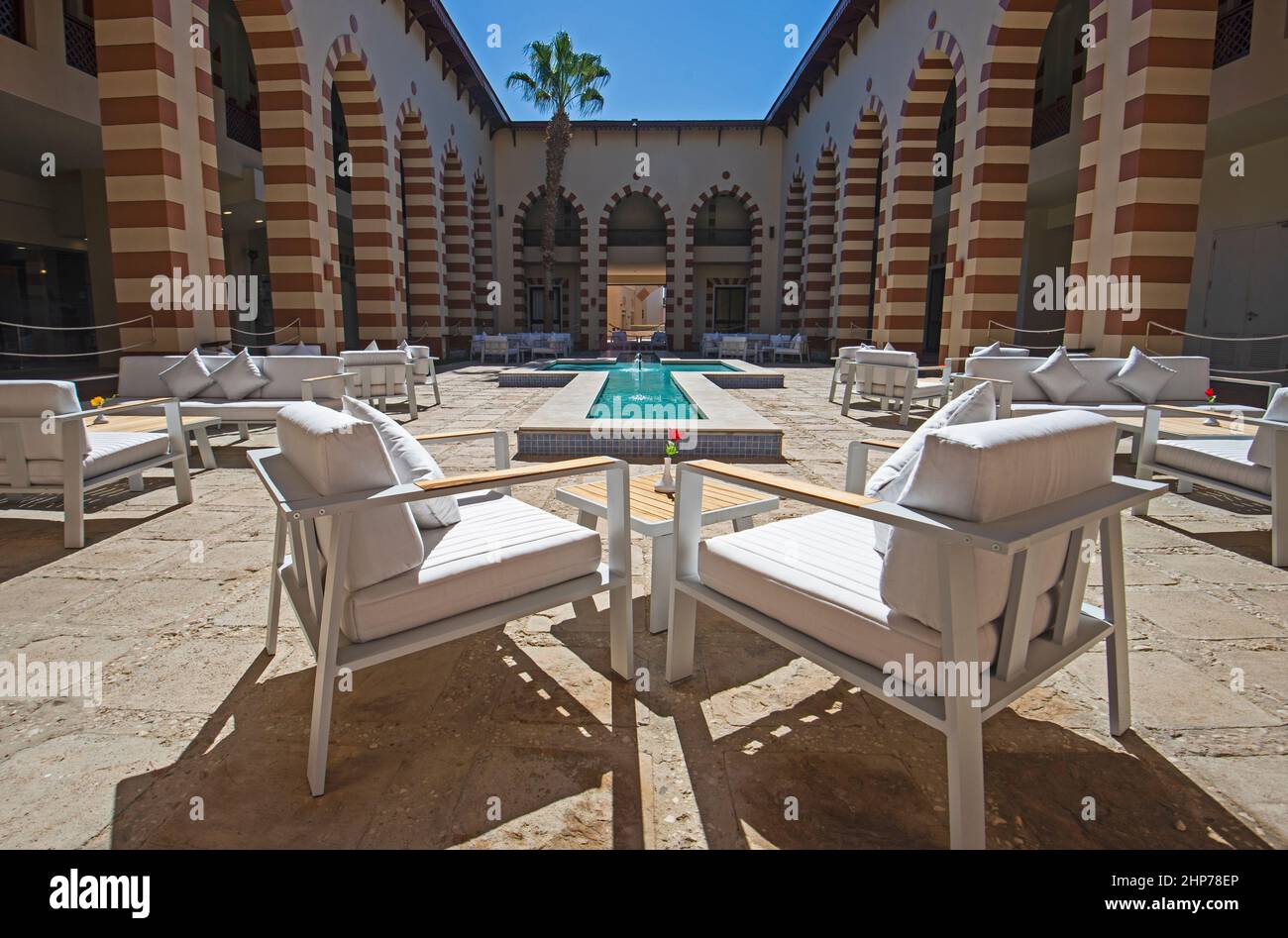 Outdoor patio terrace seating cafe area with table and chairs at ...