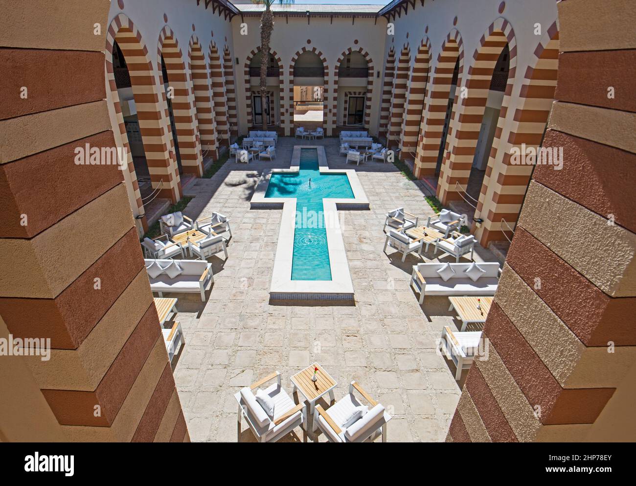 Outdoor patio terrace seating cafe area with table and chairs at ...