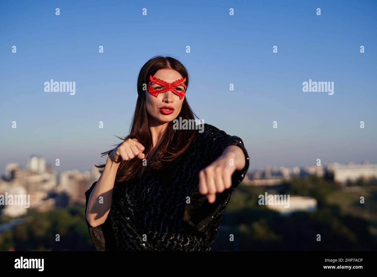 Female power, protest, women rights concept. Brunette superhero girl in ...