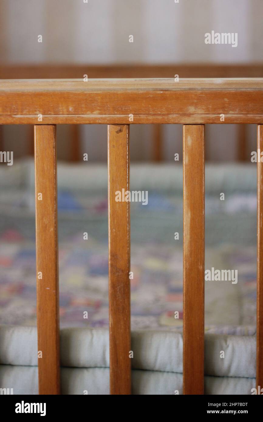 The vertical slats on a vintage baby crib Stock Photo - Alamy