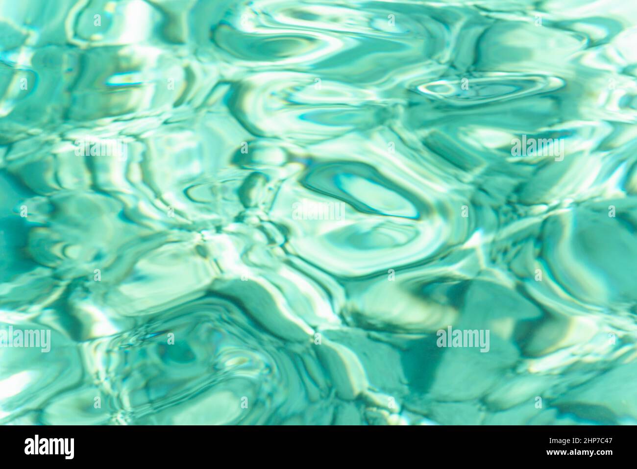 Underwater shallow waves rippling turquoise water in a sea background ...