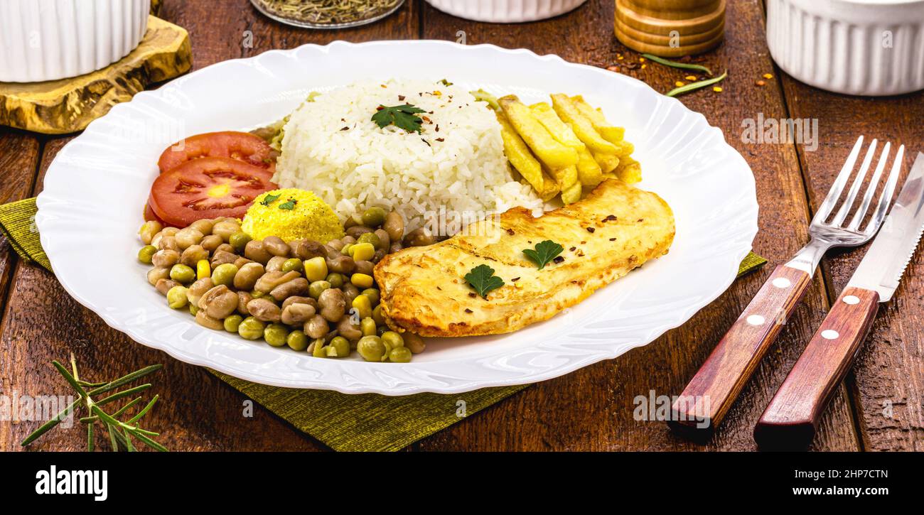 rice and beans served with french fries, grilled chicken fillet and ...
