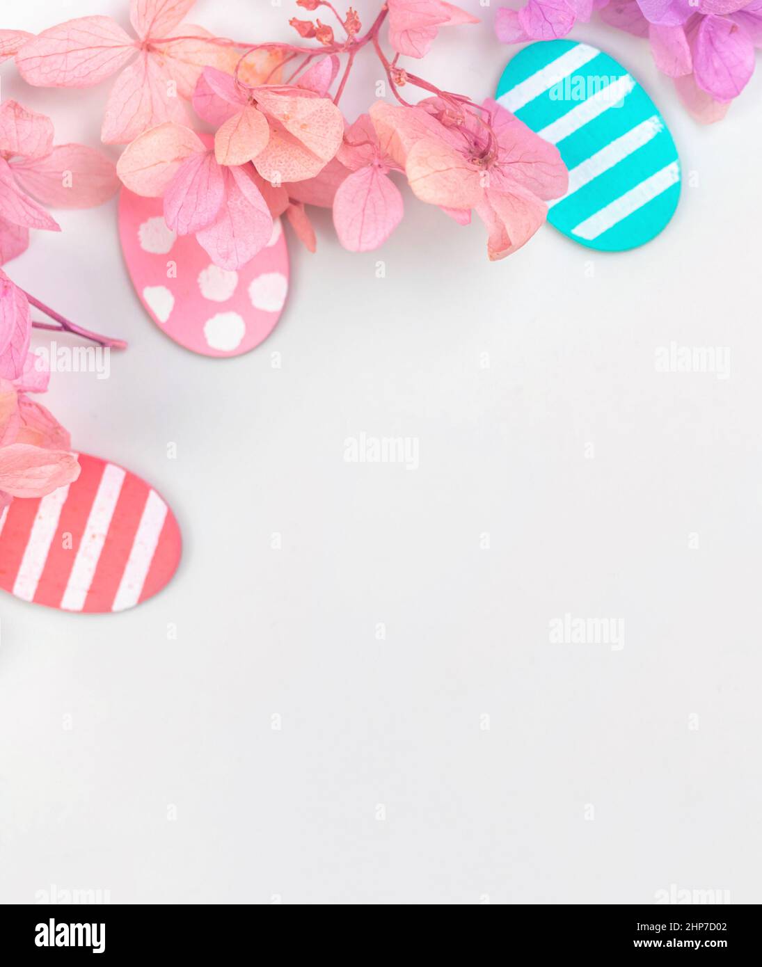 Colorful easter eggs and flowers. Border design with pink spring ...